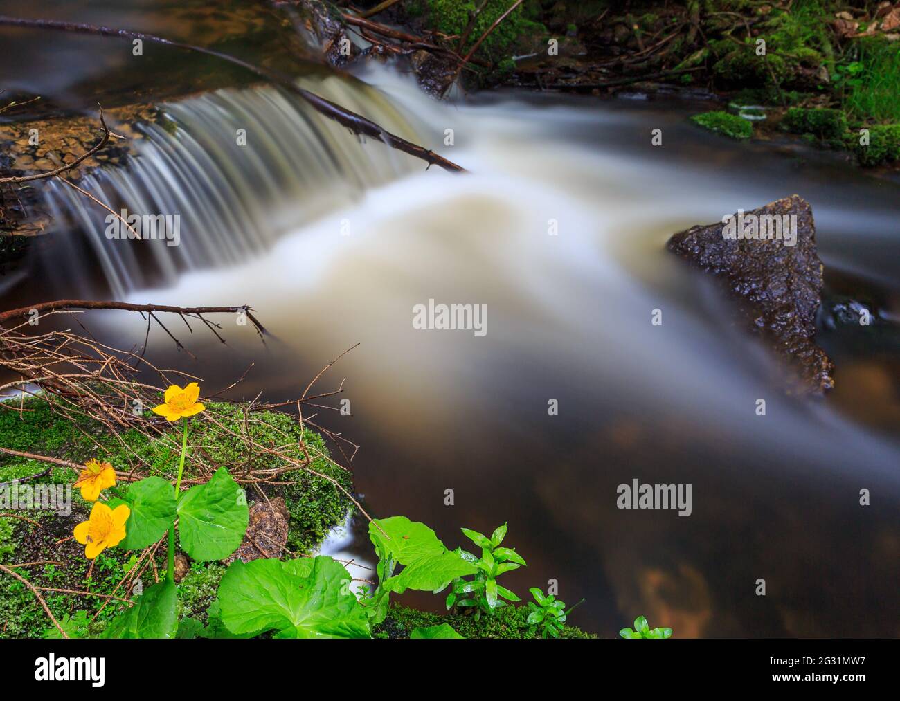 Beautiful waterfall with smooth water. This image has a flim grain ...