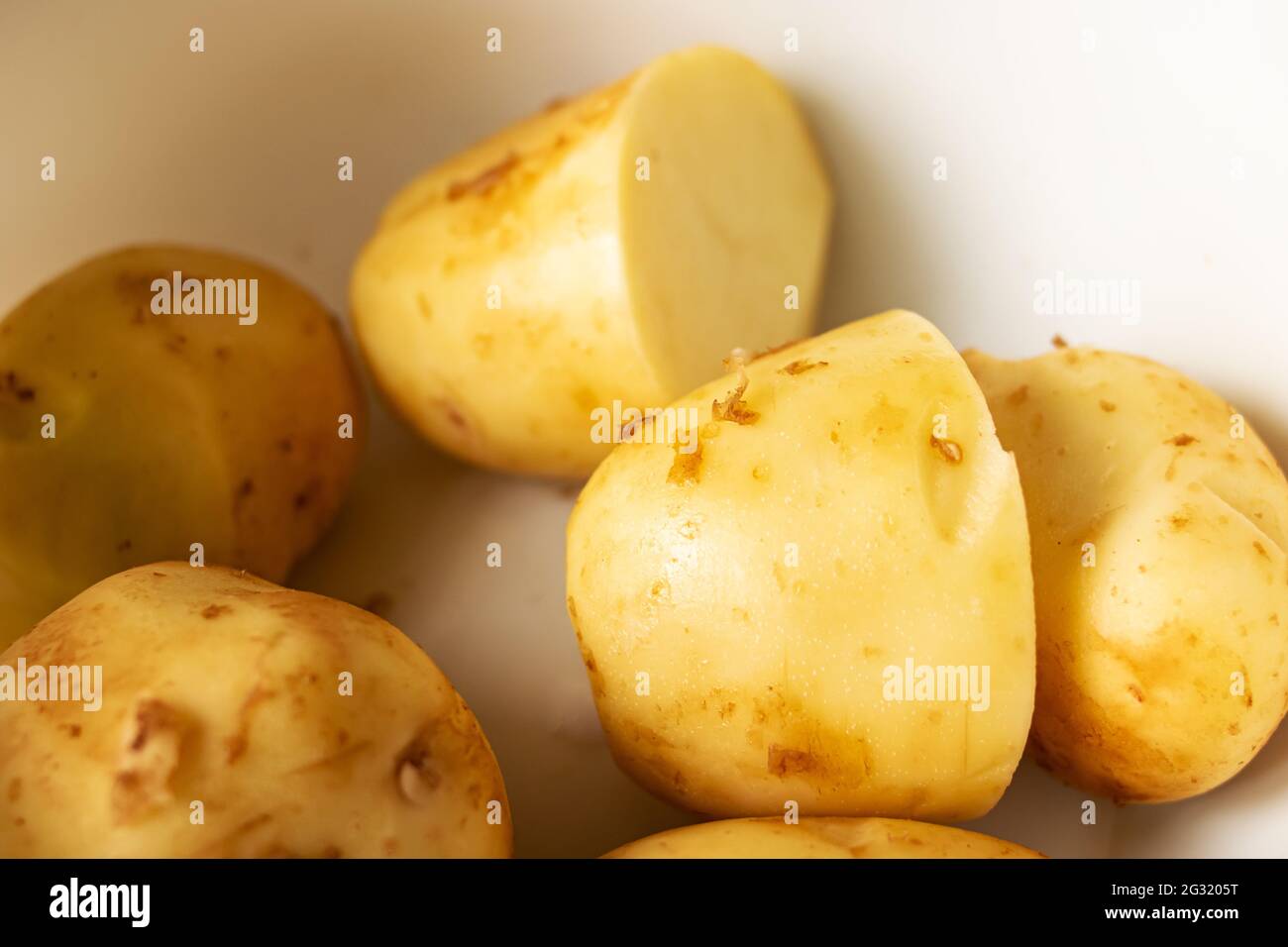 Peeling organic yellow potatoes potato hi-res stock photography and ...