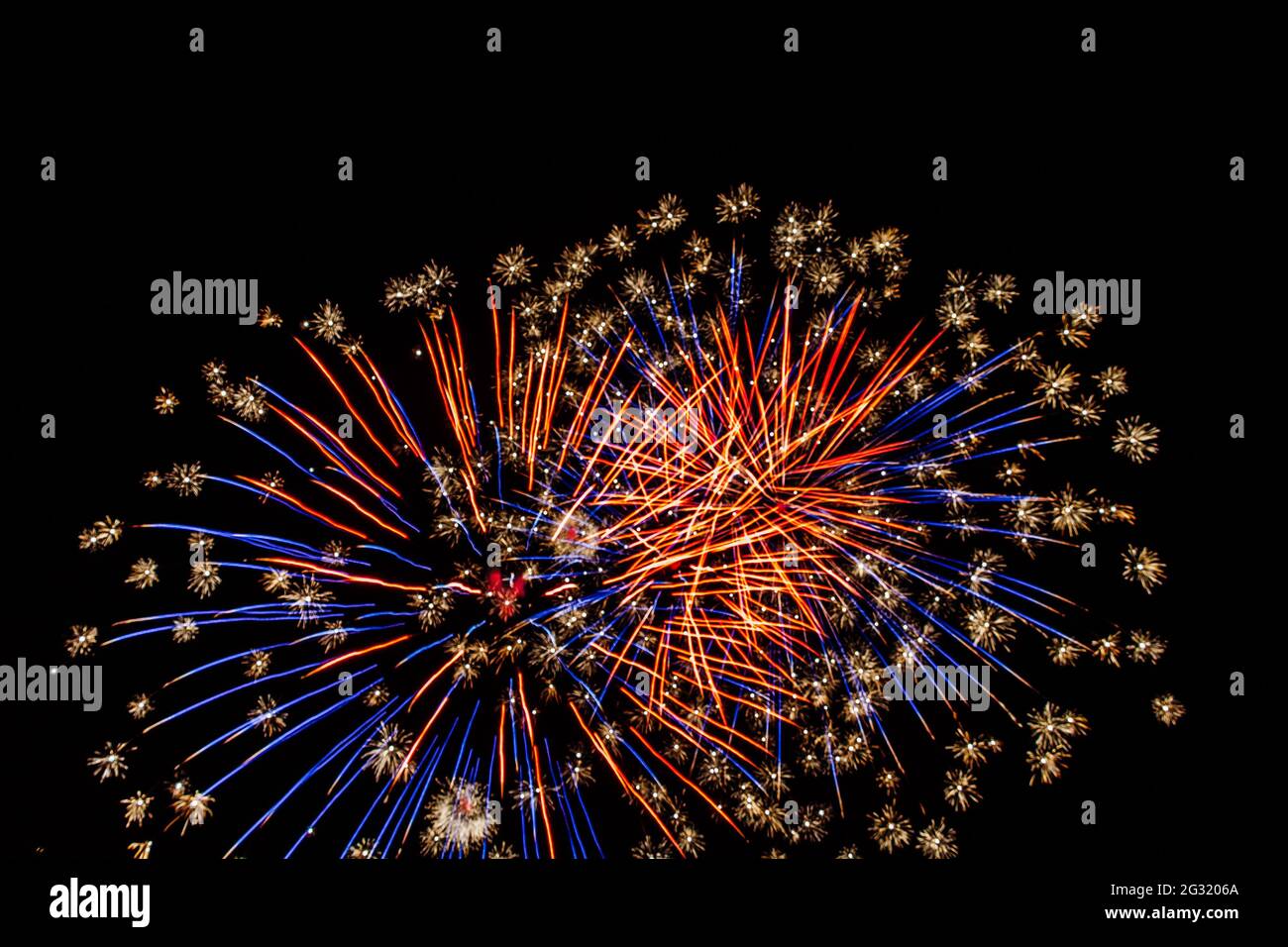 Dark sky with colorful firework blast Stock Photo - Alamy