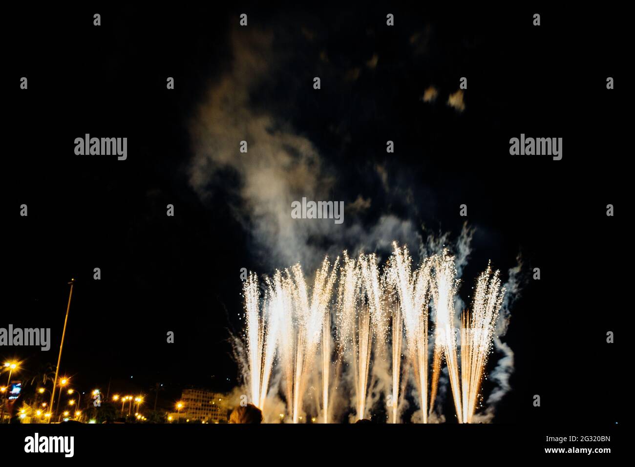 Dark sky with colorful firework blast Stock Photo - Alamy