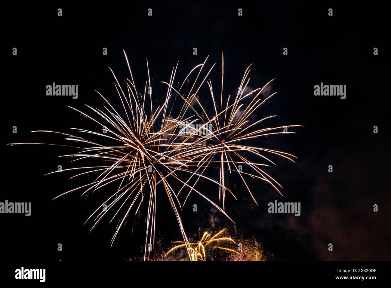 Dark sky with colorful firework blast Stock Photo - Alamy