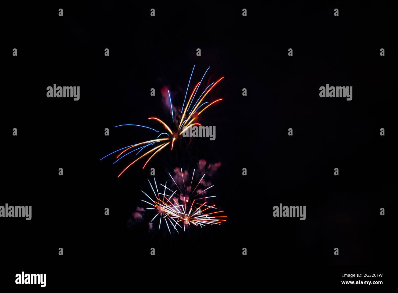 Dark sky with colorful firework blast Stock Photo - Alamy