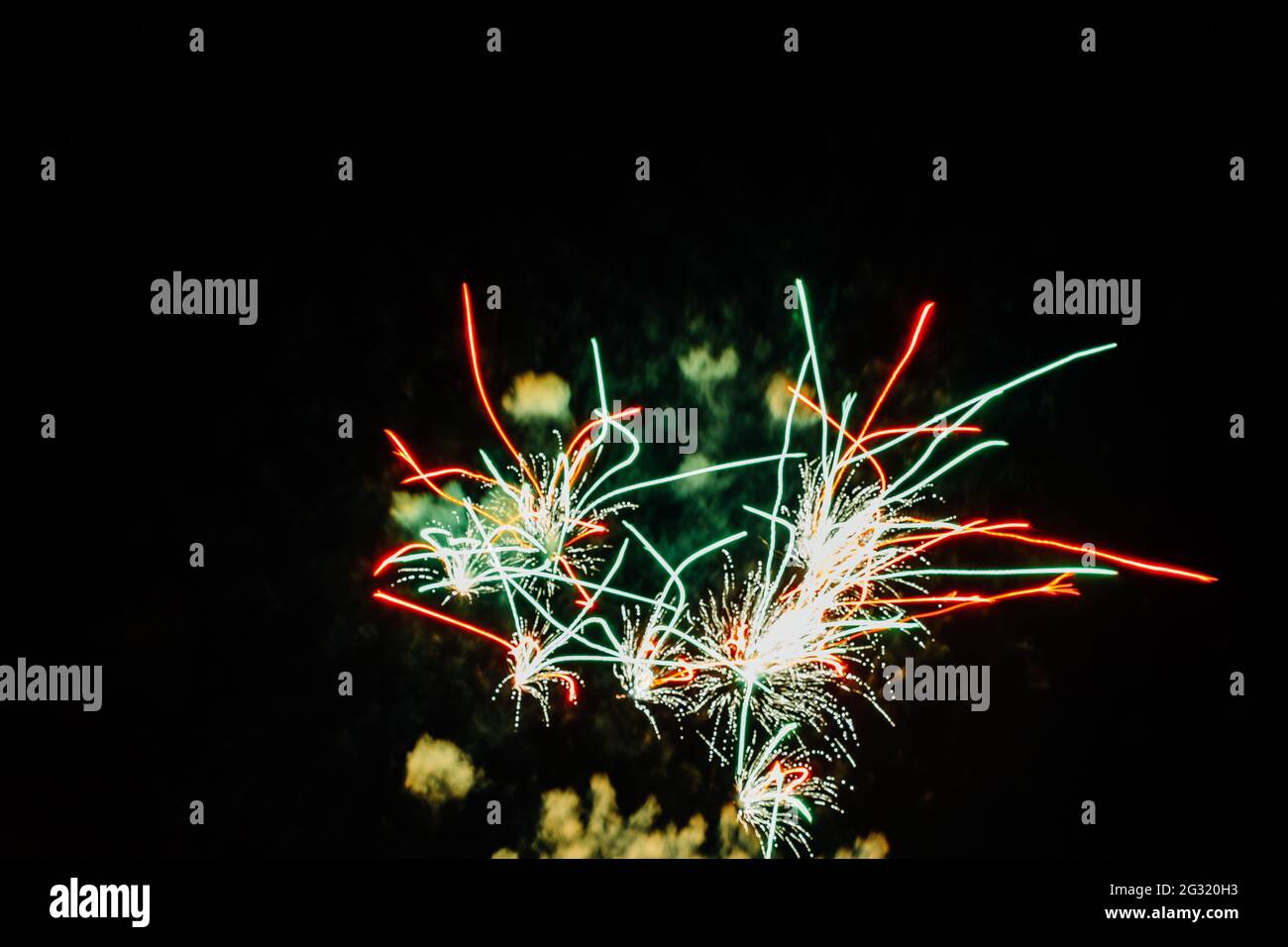 Dark sky with colorful firework blast Stock Photo - Alamy