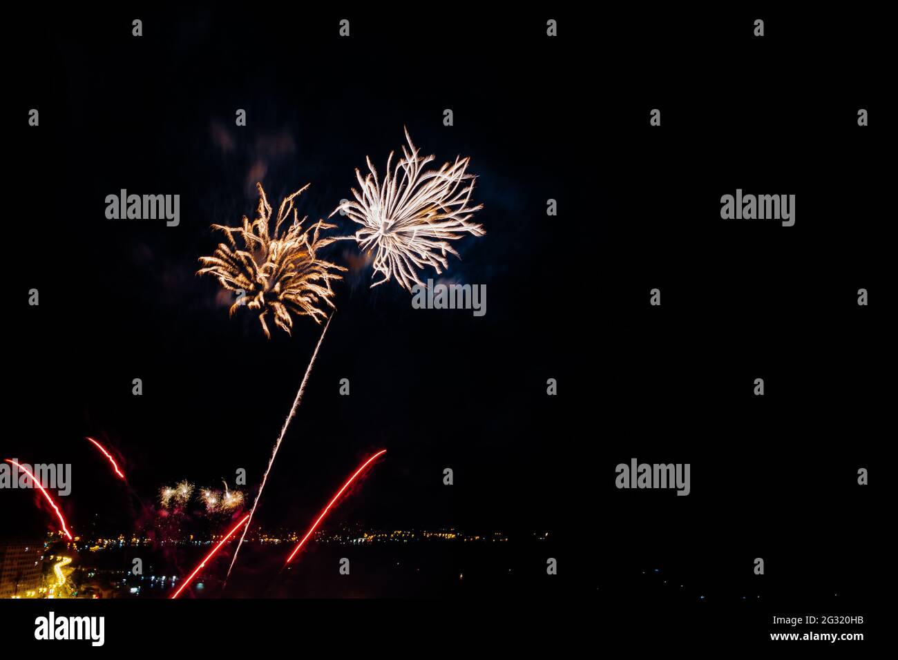 Dark sky with colorful firework blast Stock Photo - Alamy