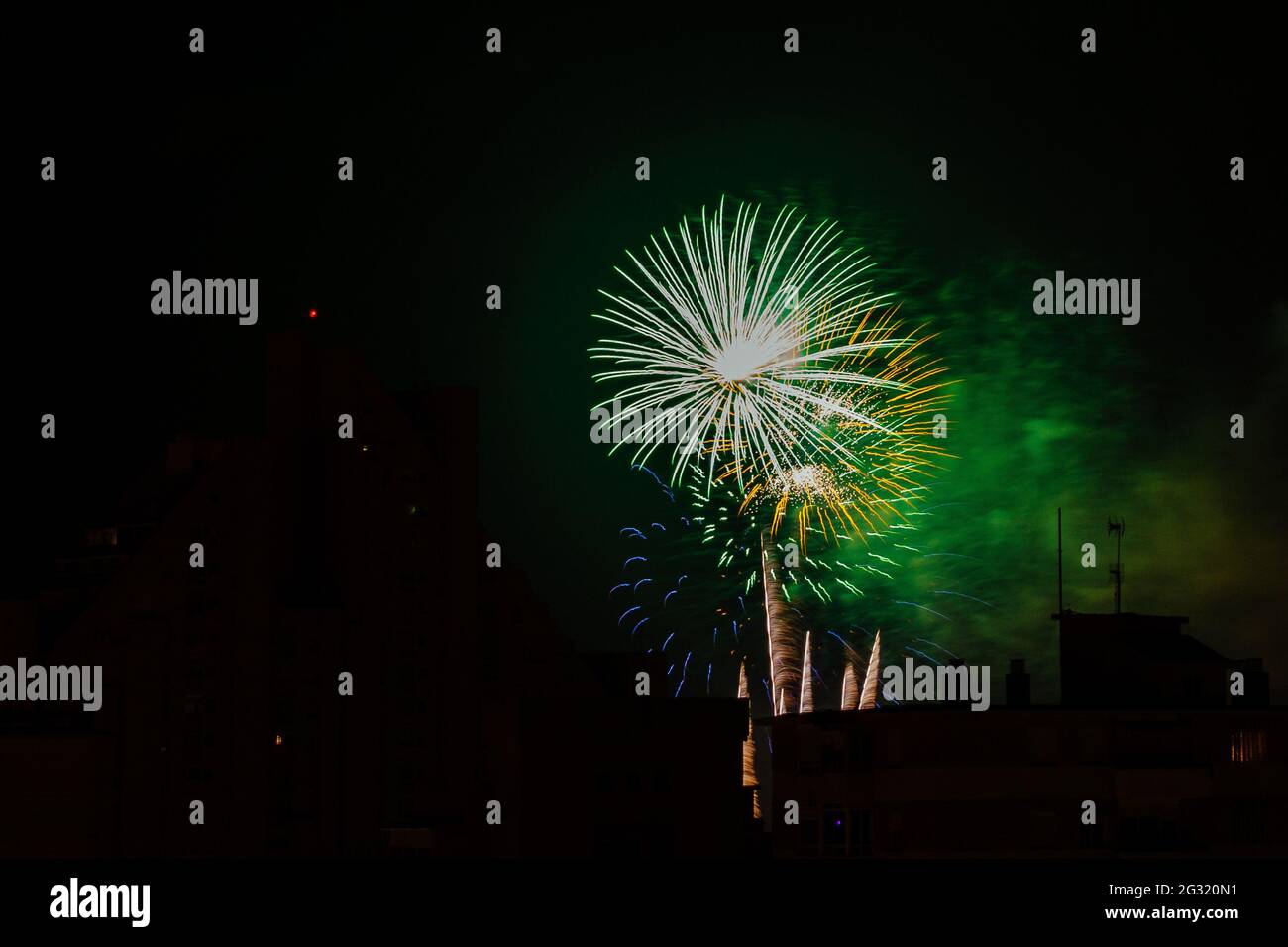 Dark sky with colorful firework blast Stock Photo - Alamy
