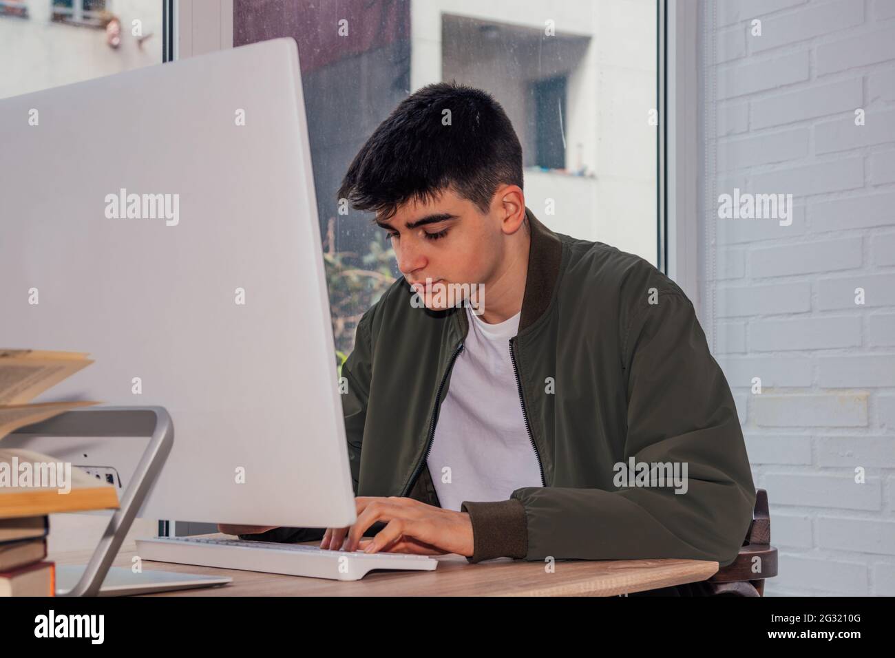student with computer working or studying Stock Photo - Alamy
