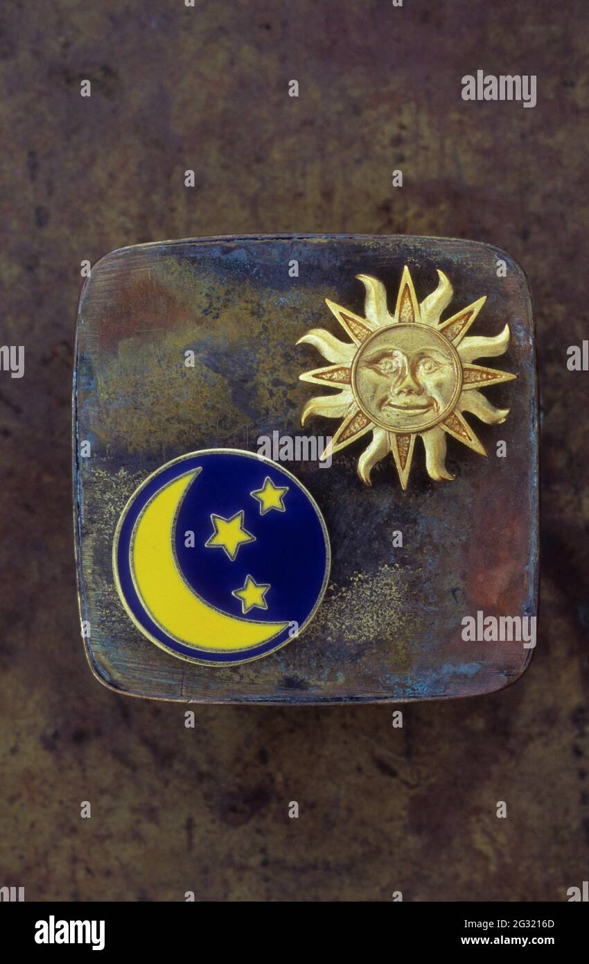 Badges or brooches or pins depicting smiling golden sun and crescent ...