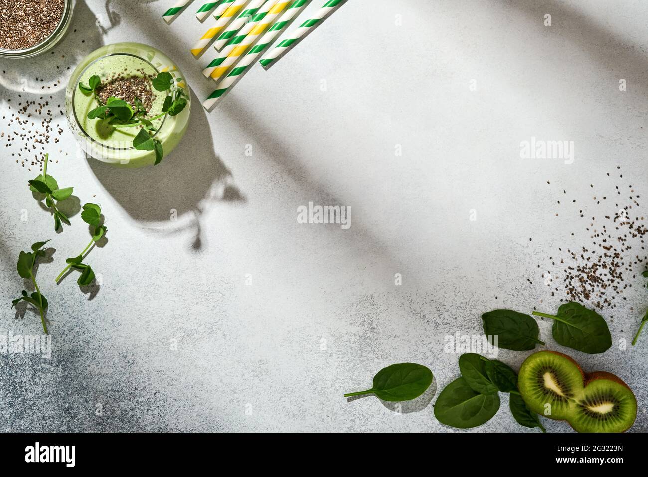 Glass of healthy green smoothie and ingredients for smoothie, fresh ...