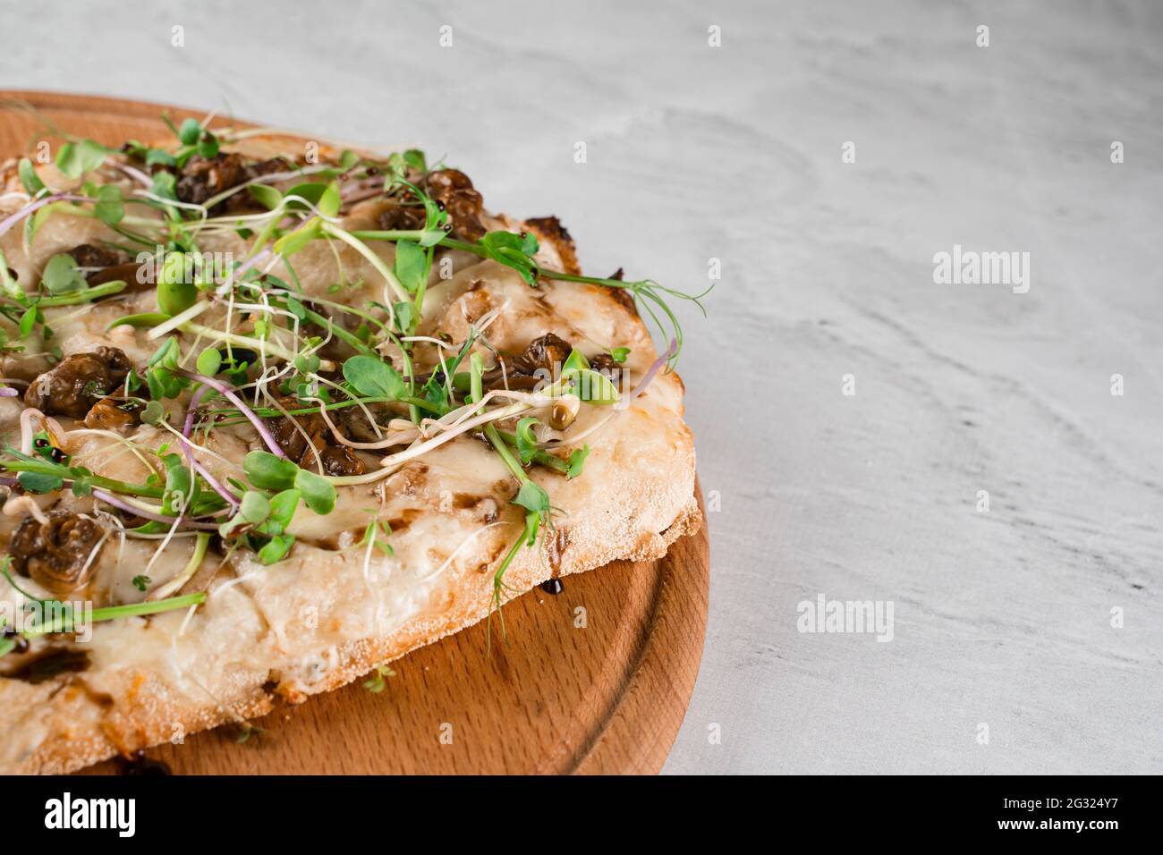 Italian pinsa romana with french escargot grape snails on white ...