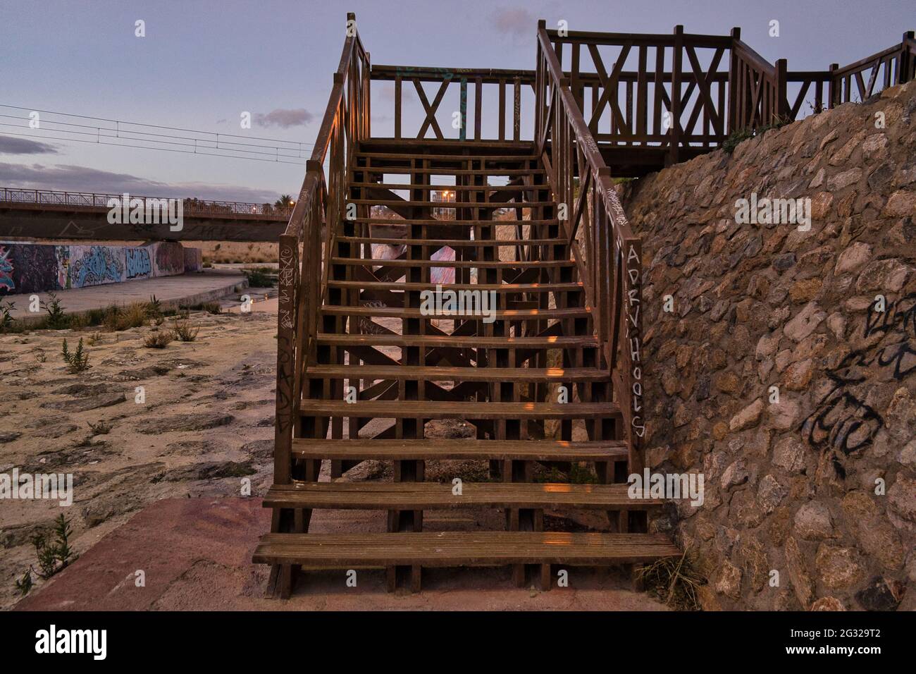 wooden stairs in the cuse in the dry river of Albufereta, located in ...