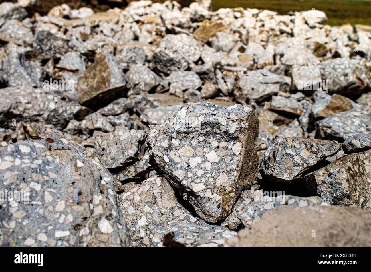 The wreckage of the house. Pieces of the wall on the ground. The ...