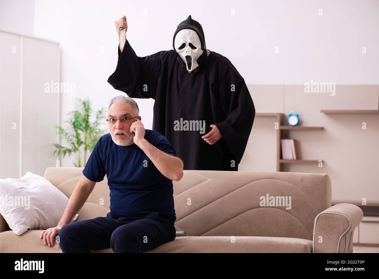 Devil coming to old dying man Stock Photo - Alamy