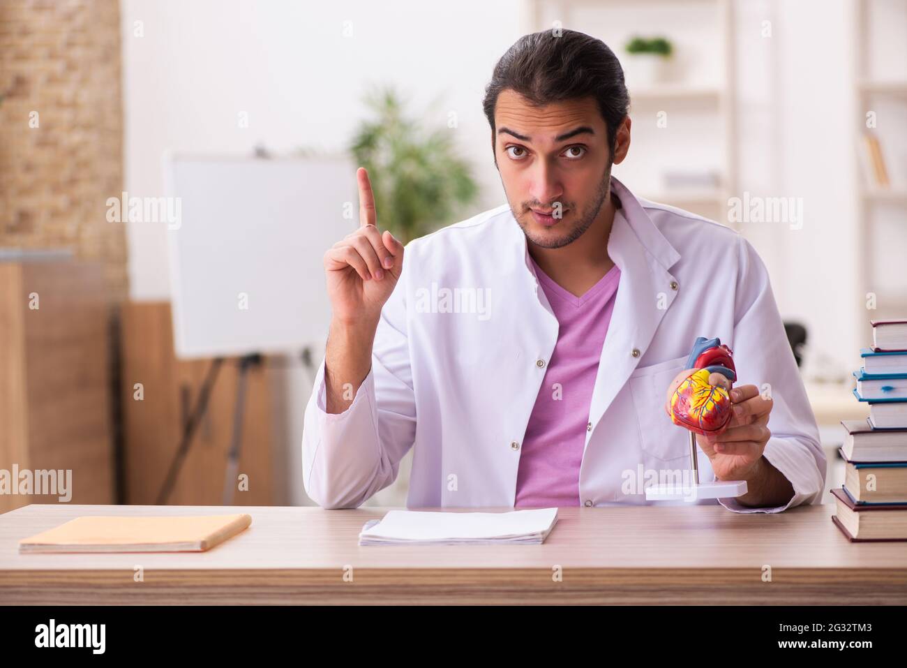 Young doctor student cardiologist sitting in the classroom Stock Photo ...