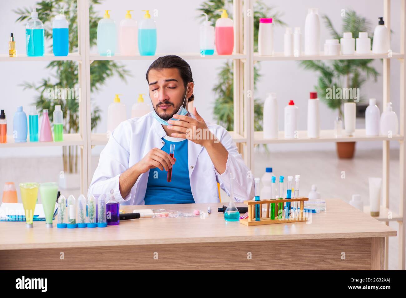 Young chemist testing soap in the lab Stock Photo - Alamy
