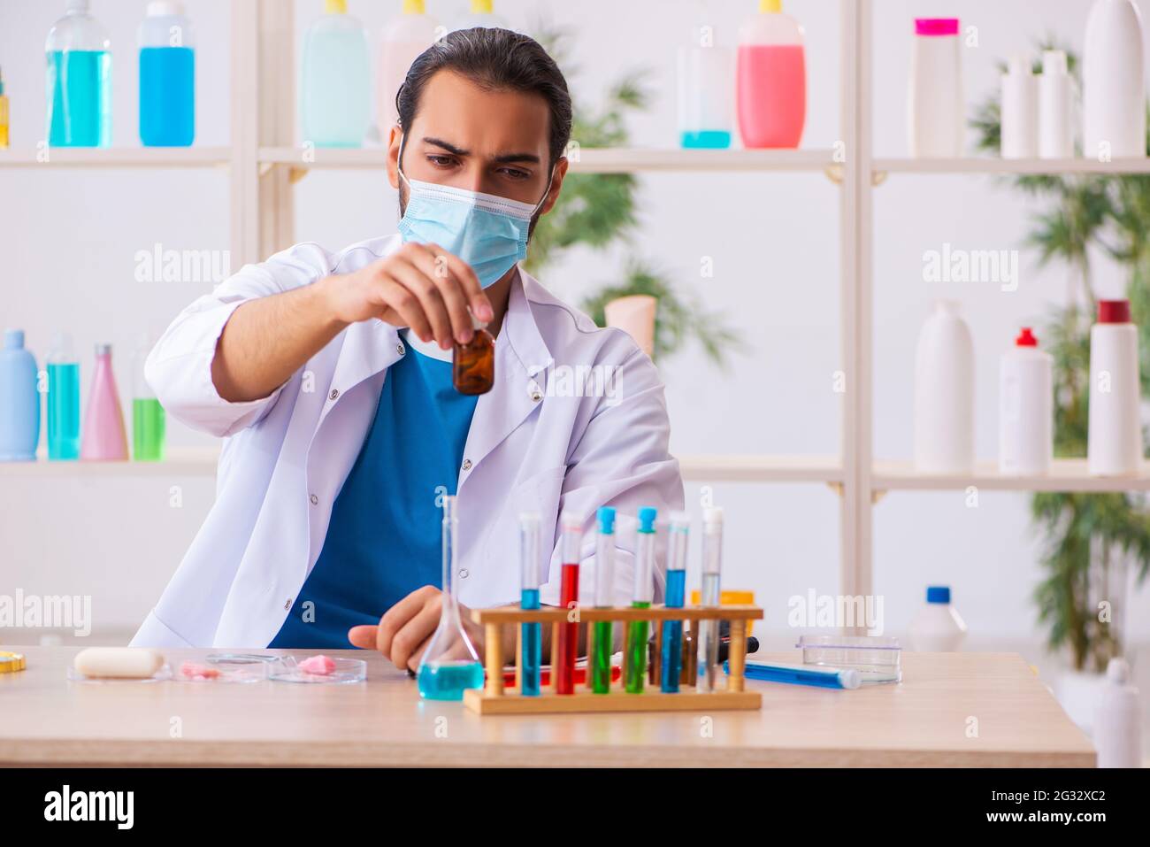 Young chemist testing soap in the lab Stock Photo - Alamy