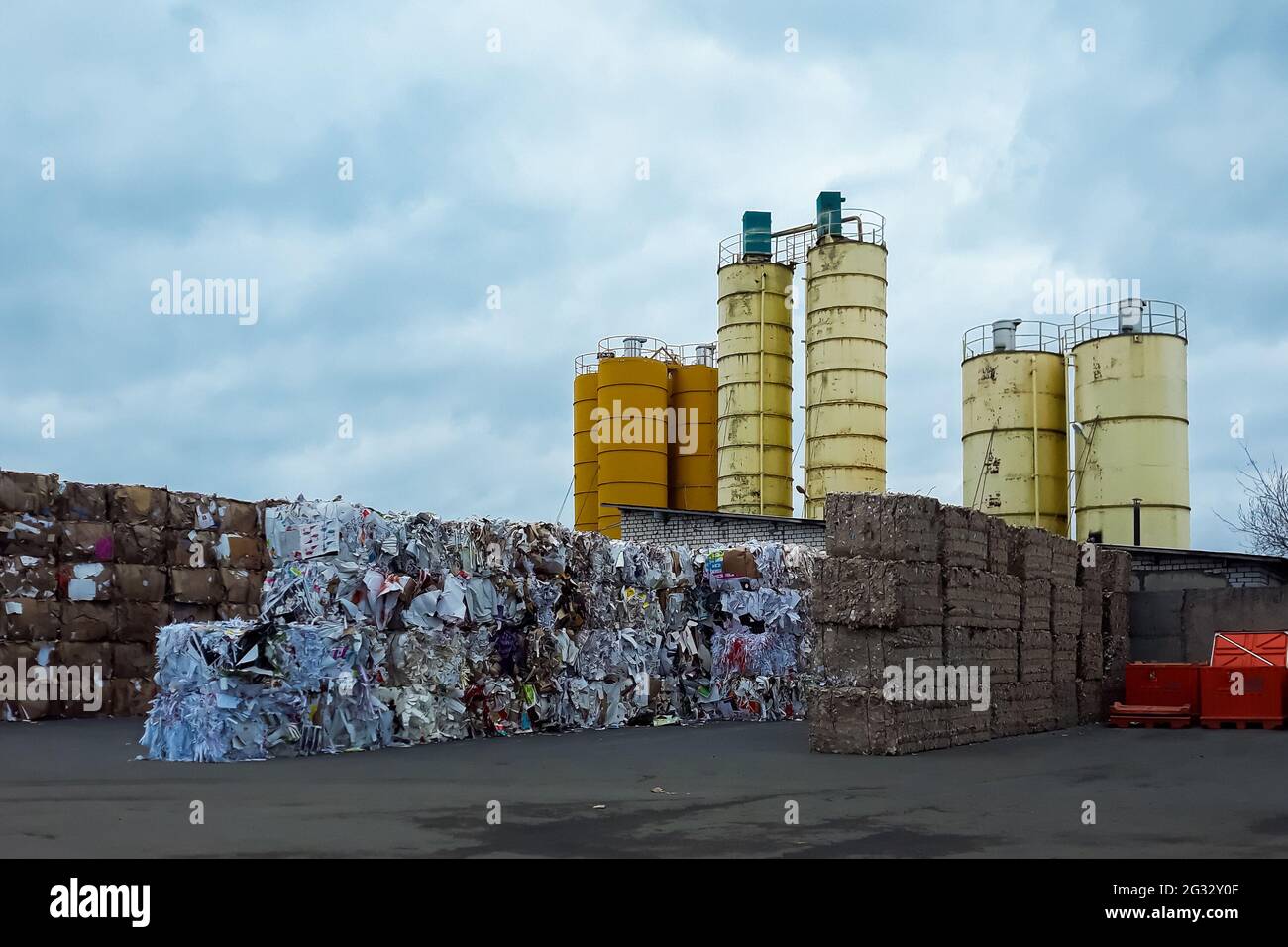 Factory for the disposal of household waste. A pile of compressed paper ...
