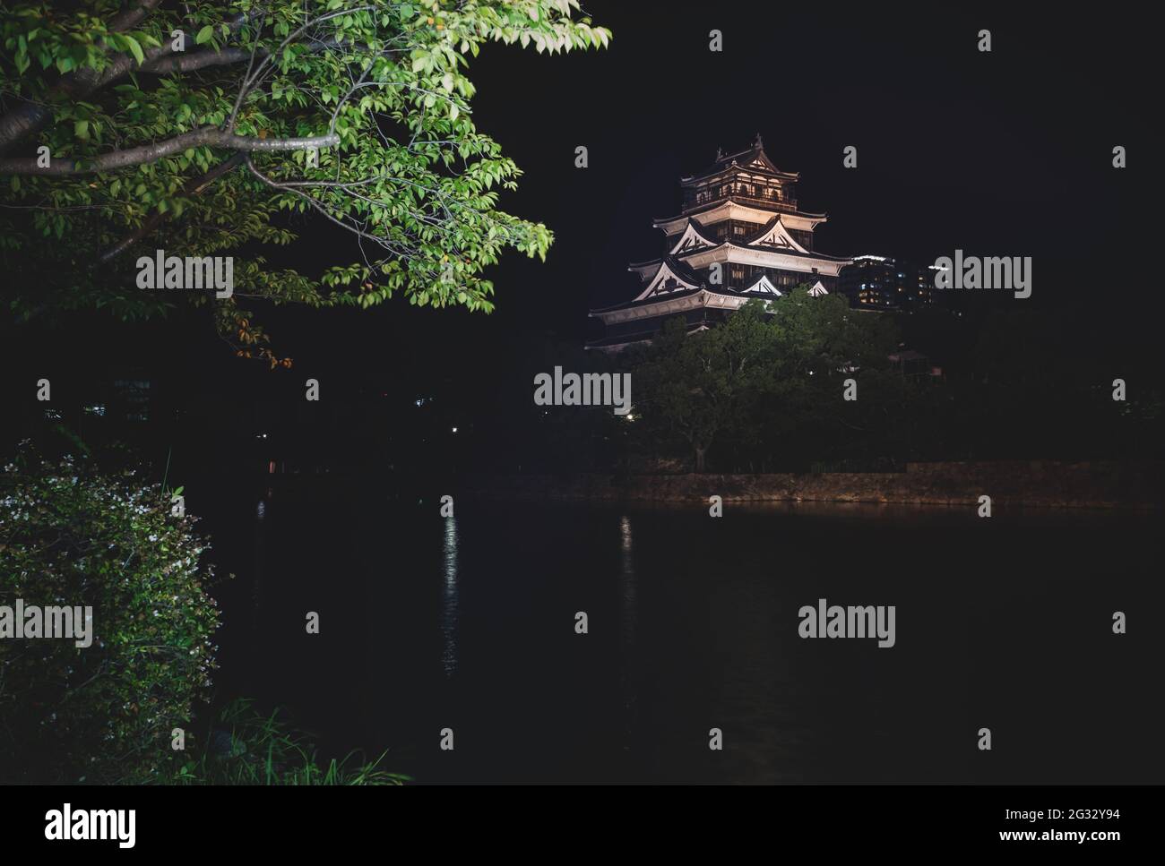 The illuminated Hiroshima castle, also called Carp Castle, surrounded ...