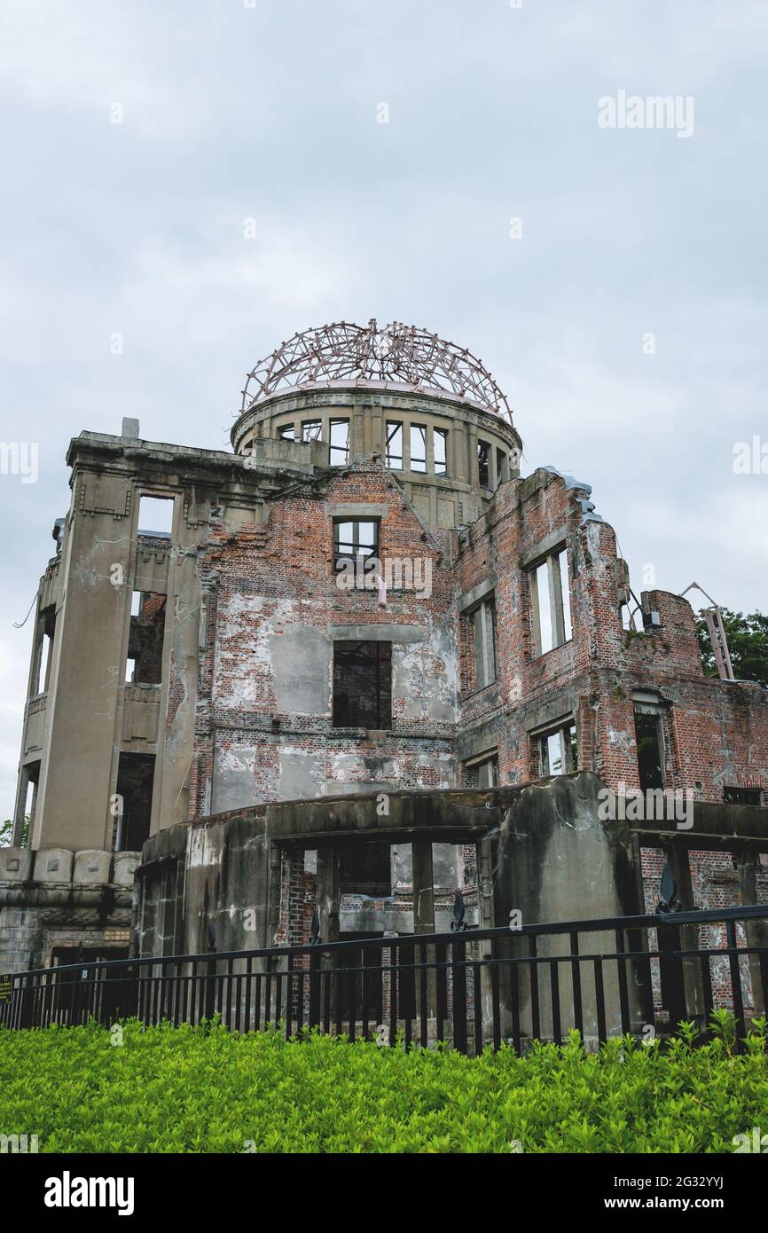 The Atomic Bomb Dome in cloudy sad weather, second world war ruins left ...