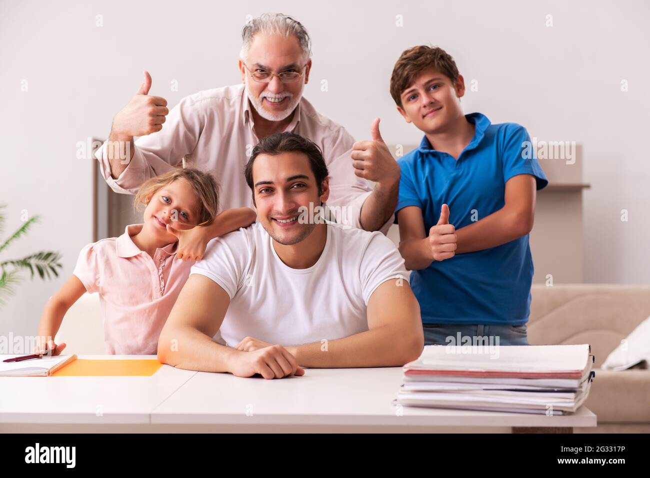 Three generations at home in early development concept Stock Photo - Alamy