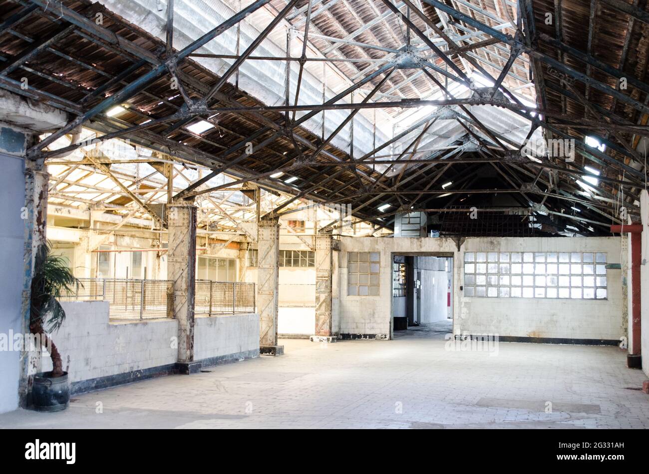 A weathered and aged abandoned warehouse Stock Photo - Alamy