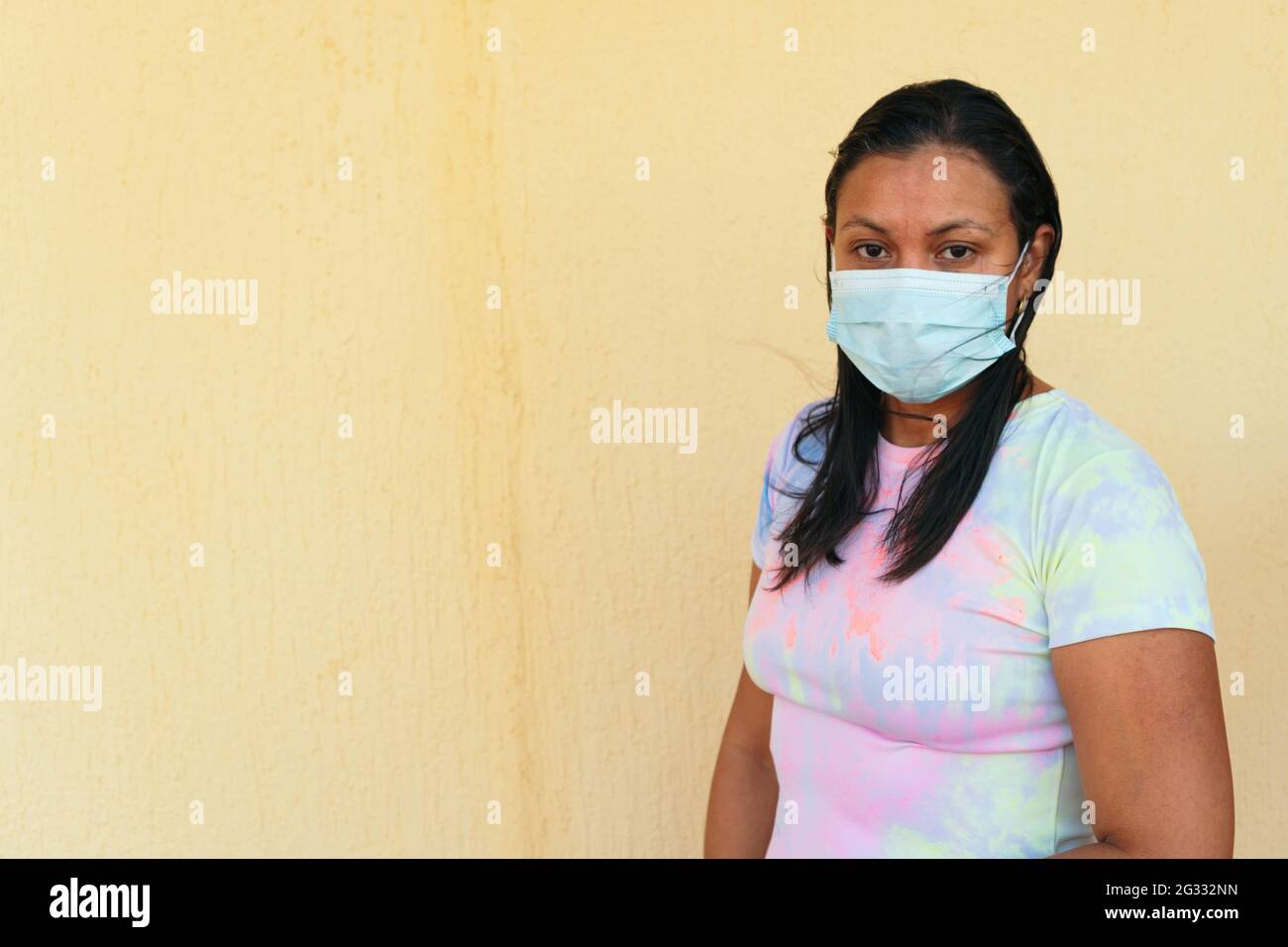 Middle aged woman wearing protective hi-res stock photography and ...