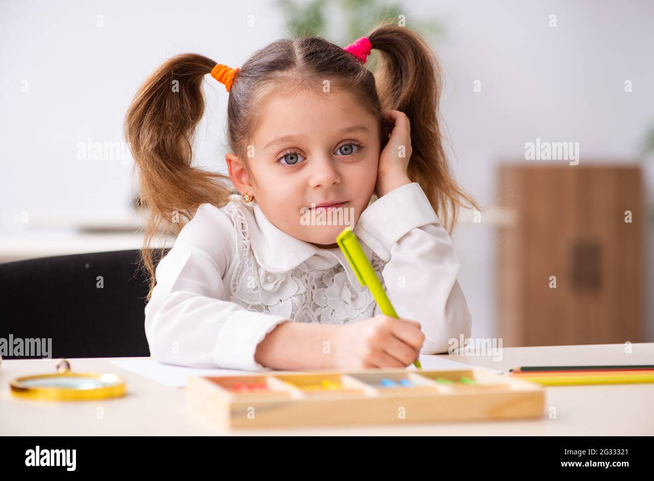 Small girl in the early development concept Stock Photo - Alamy