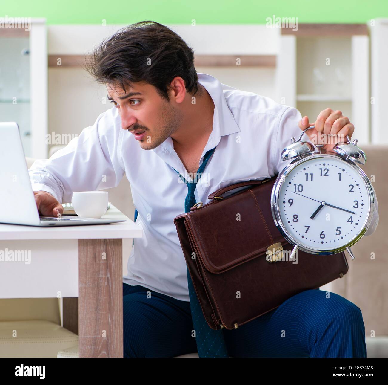 The man dressing up and late for work Stock Photo - Alamy