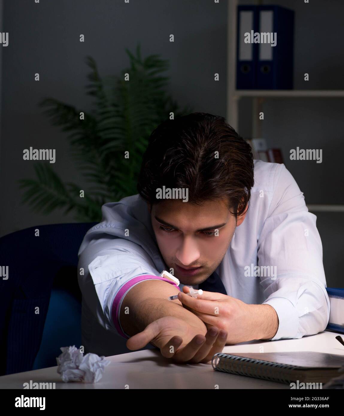 The employee relieving stress from overtime with drugs narcotics Stock ...