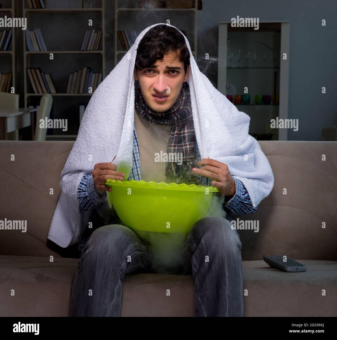 The sick man doing inhalation at night in home Stock Photo - Alamy