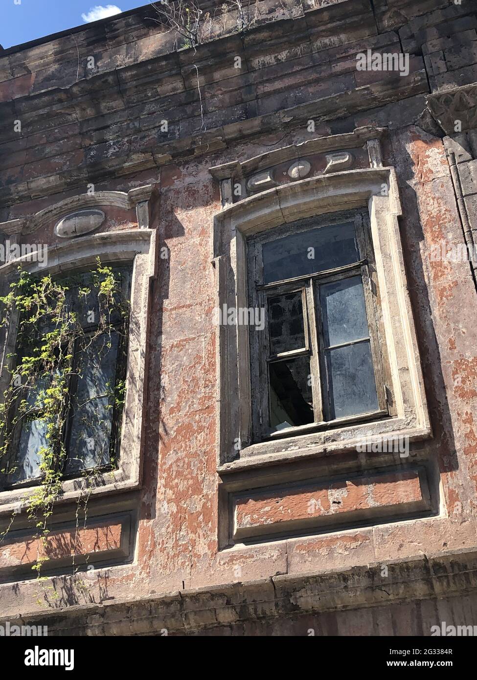 An old small window of an ancient semi-destroyed building in Ajemian ...