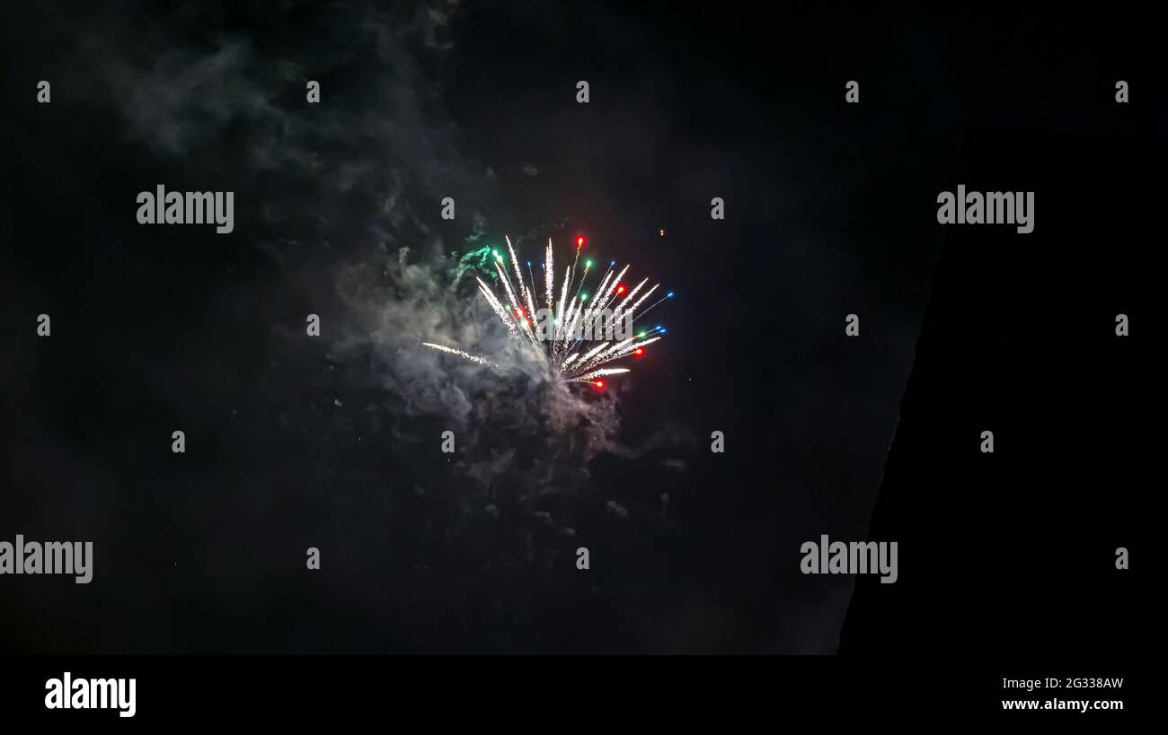 The colorful fireworks in the dark sky Stock Photo - Alamy