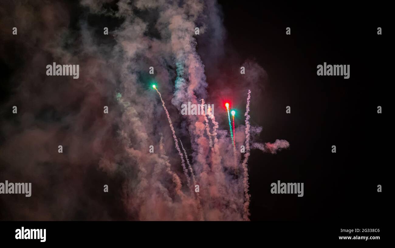 The colorful fireworks in the dark sky Stock Photo - Alamy