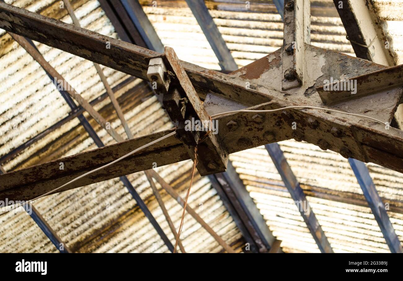 A closeup of the weathered old and rusty metal structures of the ...