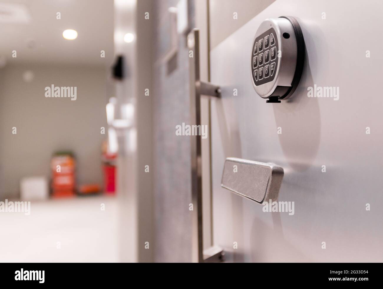 Metal vault door with handle and keypad for authorization and opening ...