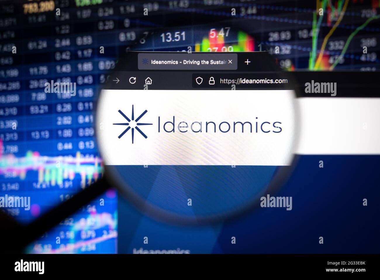 Ideanomics company logo on a website with blurry stock market ...