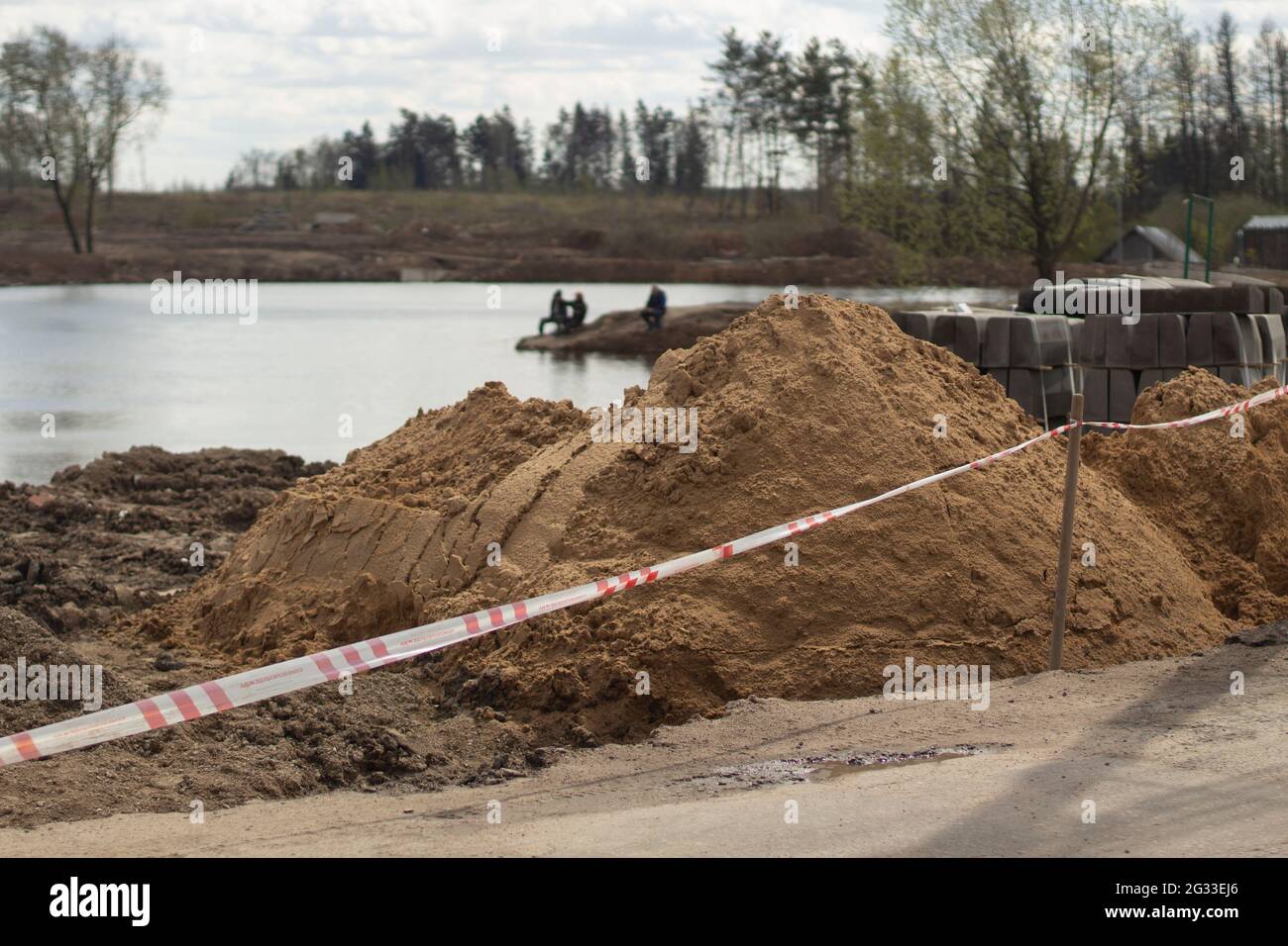 Mountains of sand at a construction site. Construction site near the ...