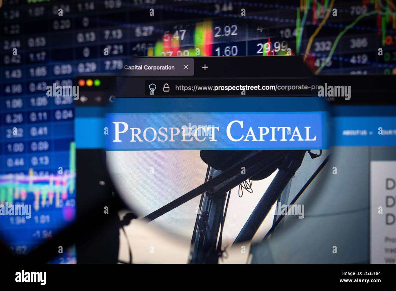 Prospect Capital company logo on a website with blurry stock market ...