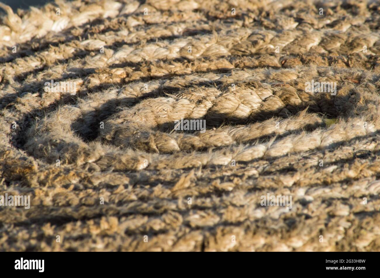 A closeup of the brown worn out jute rope Stock Photo - Alamy
