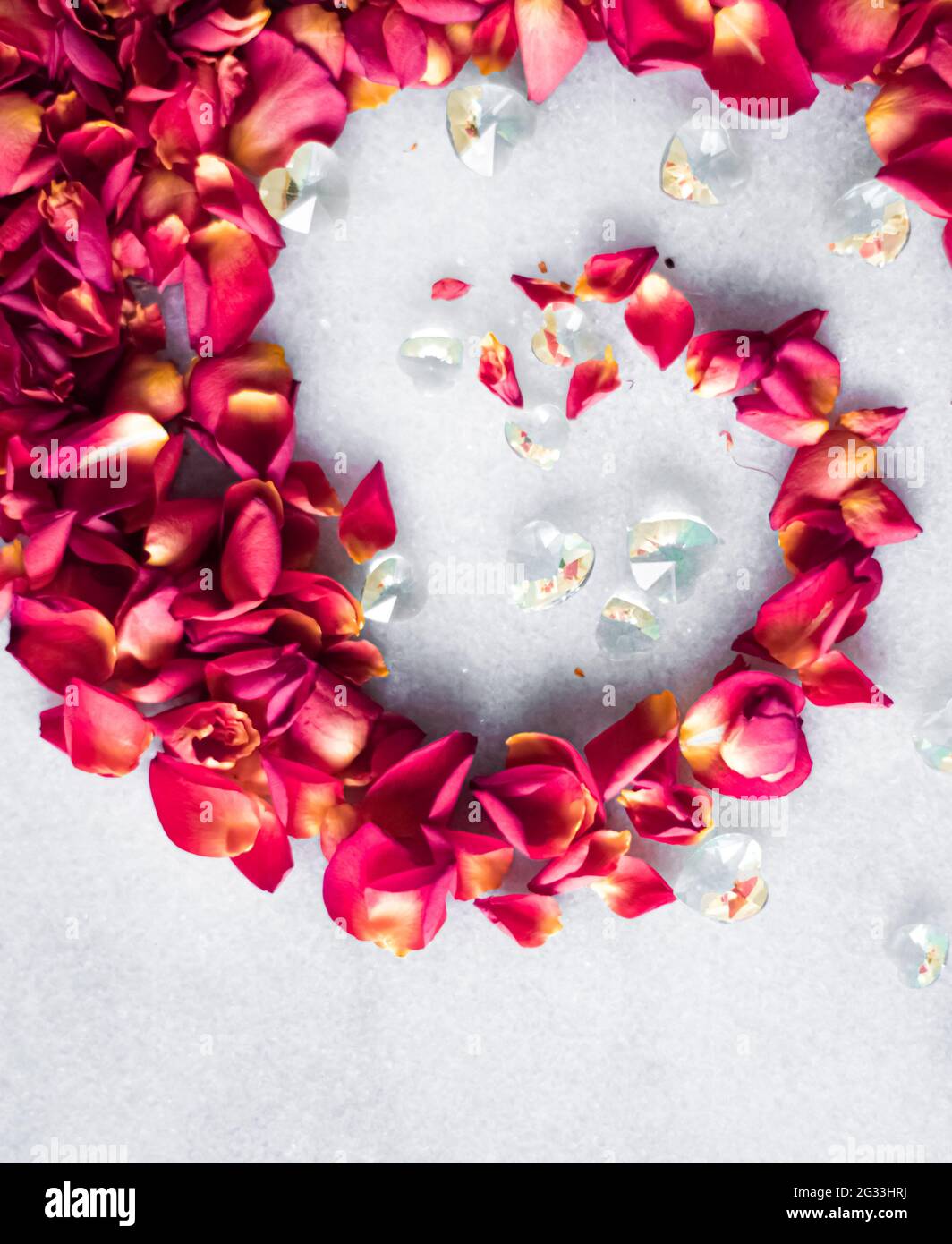 Rose petals on marble background, floral decor and wedding flatlay ...