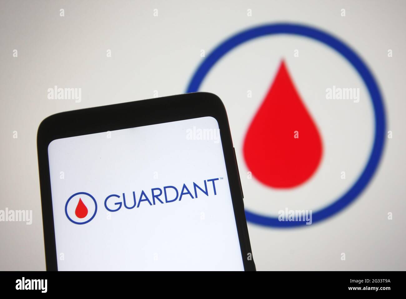 In this Photo illustration a Guardant Health logo is seen on a ...