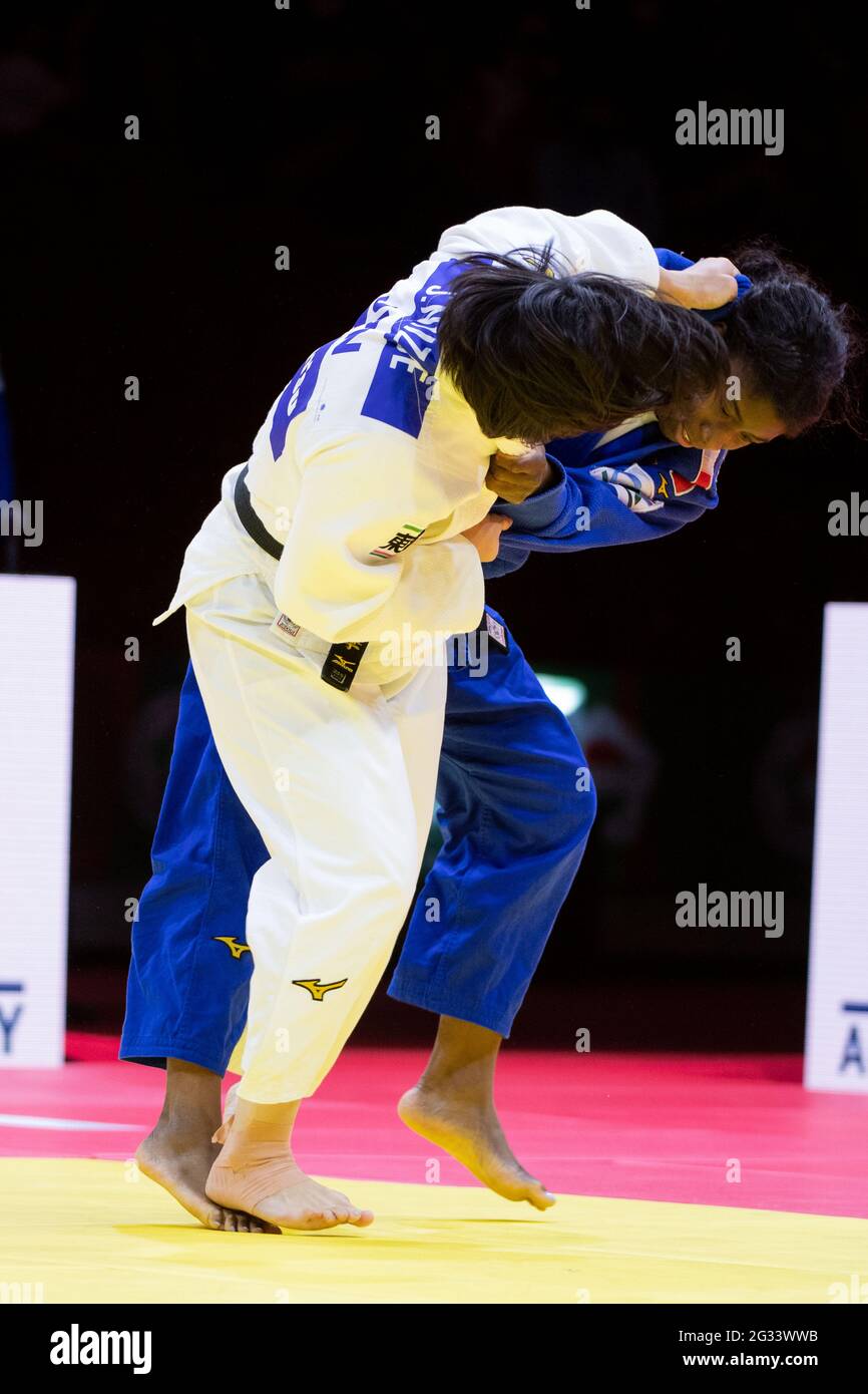 Budapest, Hungary on June 13, 2021. Saki Niizoe (white) vs Marie Eve Gahie (blue), Japan vs ...