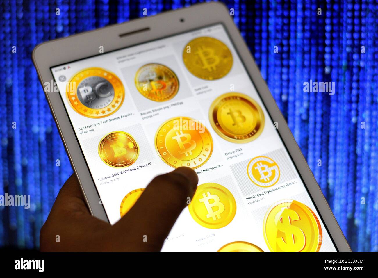In this Photo illustration the Bitcoin Cryptocurrency Logos seen ...