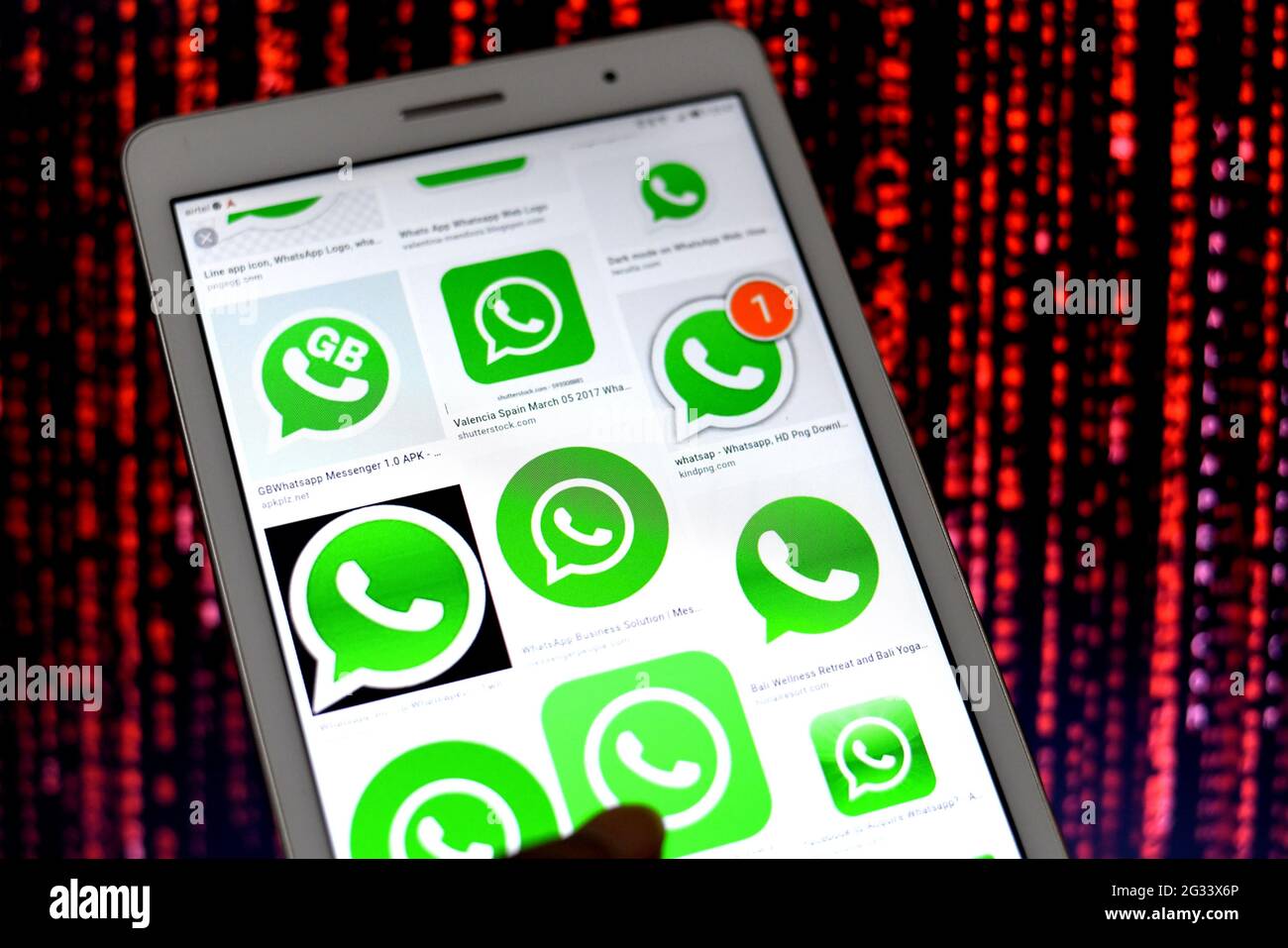 In this Photo illustration the Whatsapp Logos seen displayed on an ...