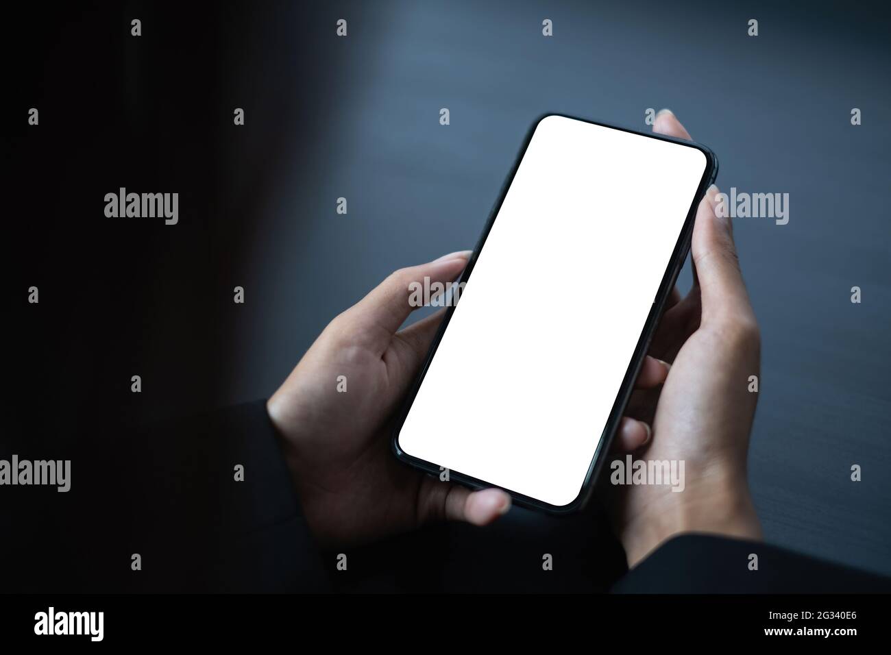 A Man hand holding smartphone device with blank screen Stock Photo - Alamy