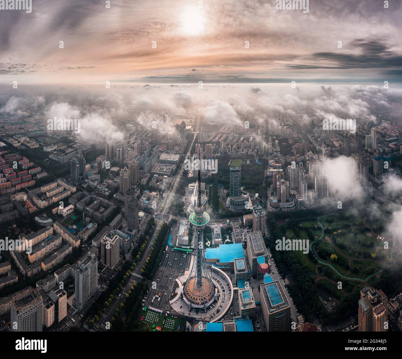 HARBIN, CHINA - JUNE 11, 2021 - Advection clouds, sunrise and solar ...