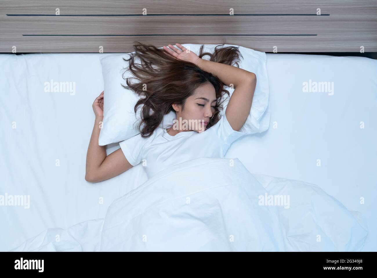 Top View of Beautiful Young Woman Sleeping Cozily on a Bed in His ...