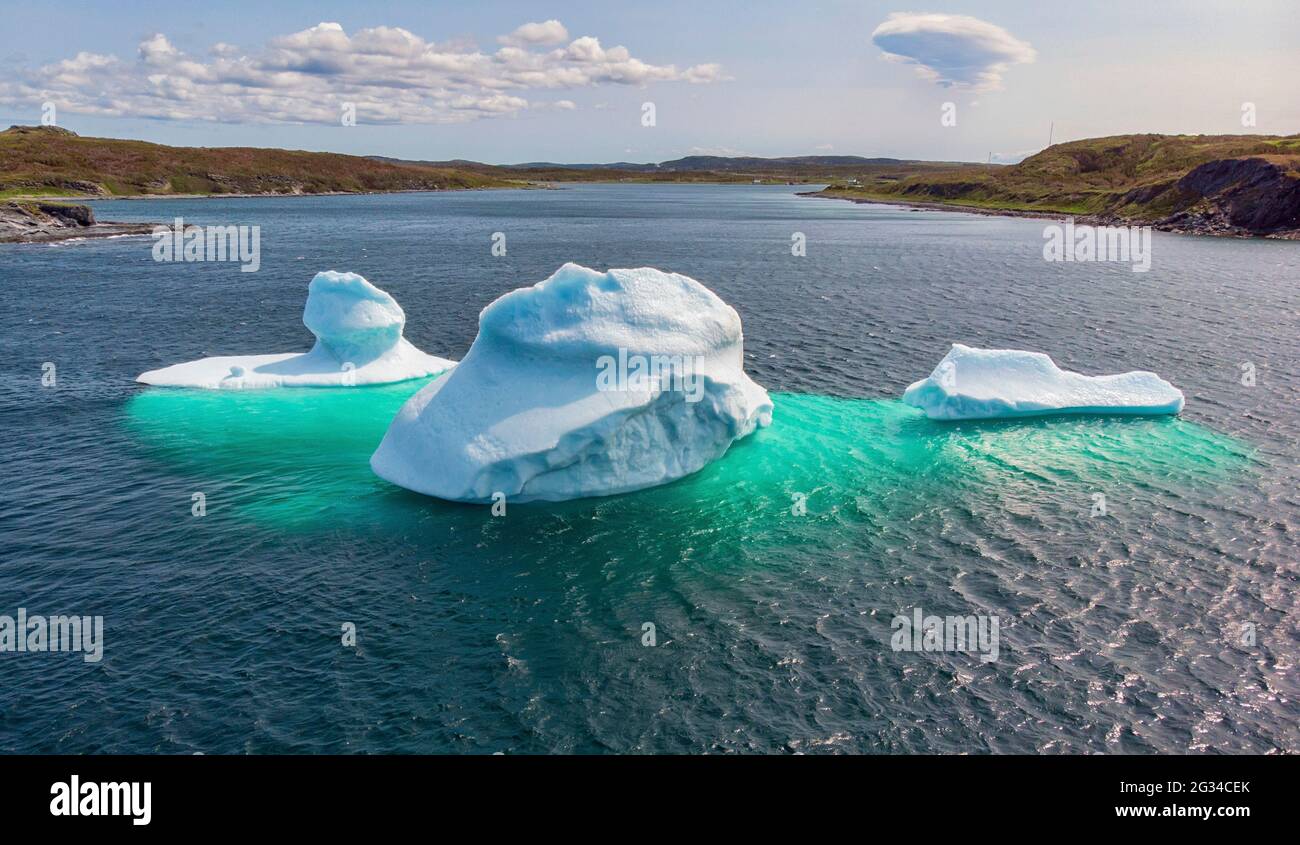 Aerial view of a large iceberg just off the coast of Newfoundland ...