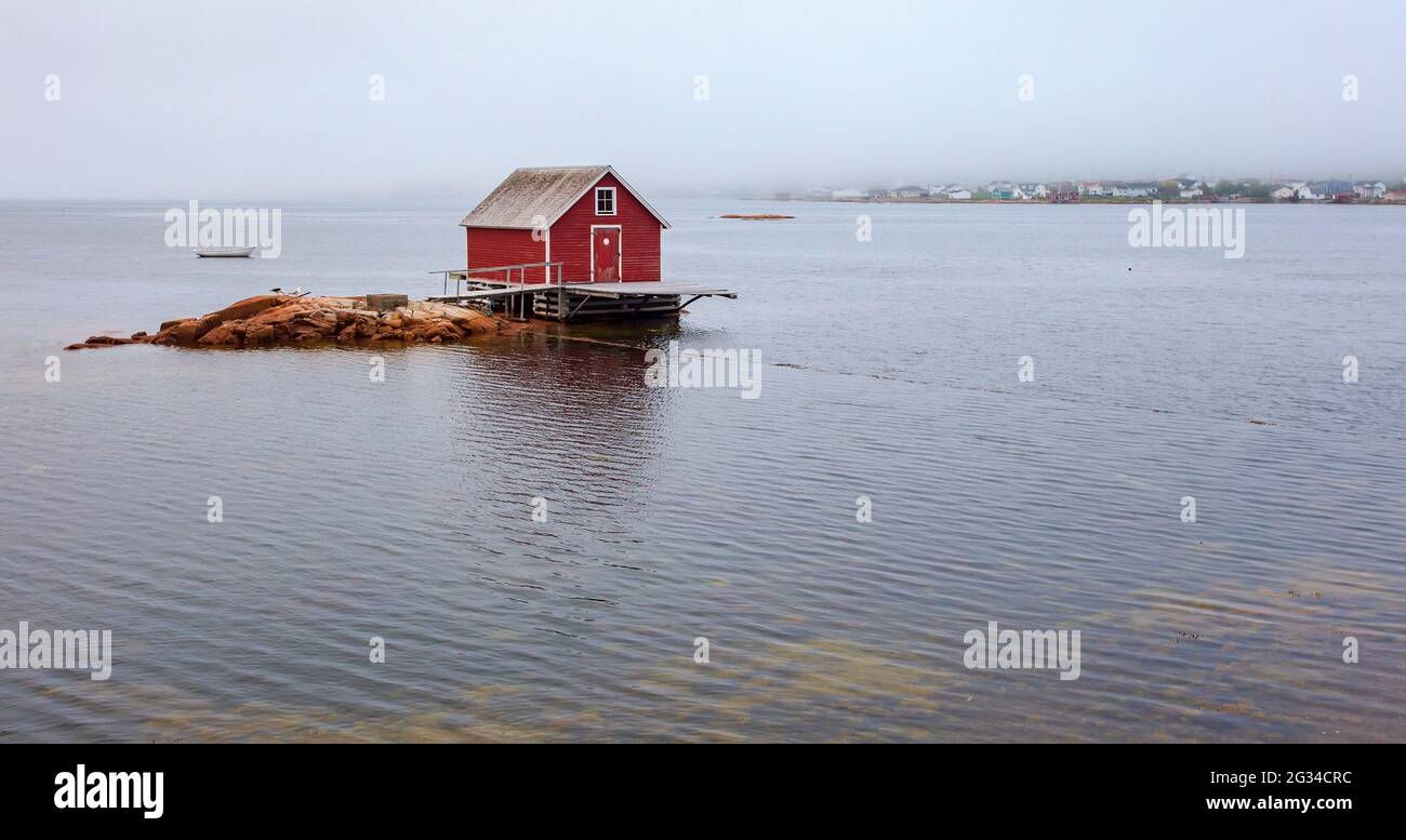 A single red fishing shack on Fogo Island, Newfoundland Stock Photo - Alamy