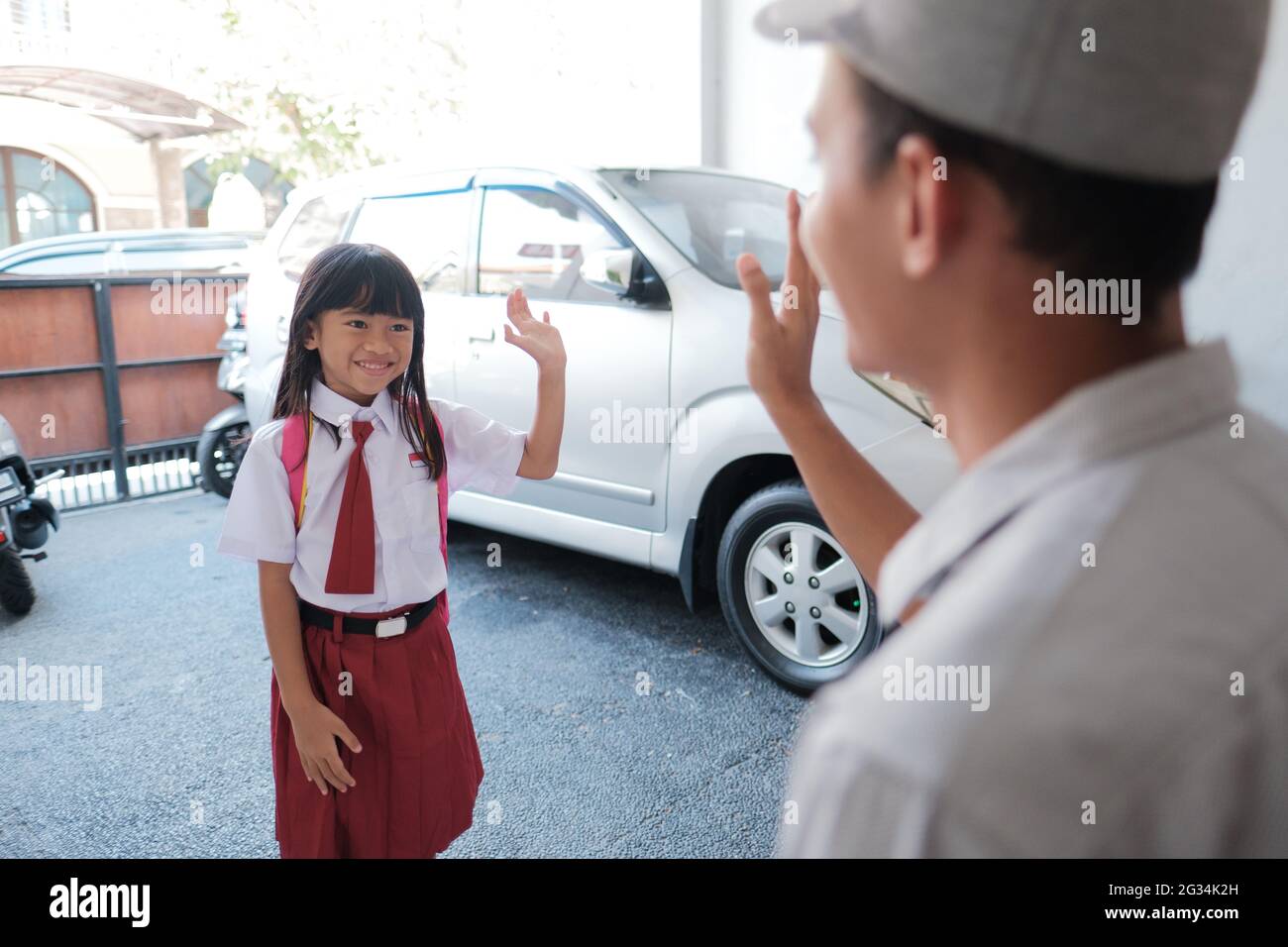 Back to school. asian pupil with primary student uniform getting ready ...