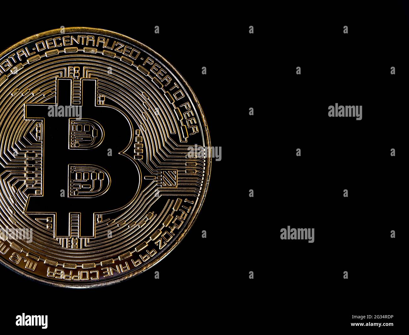 Bitcoin technology dark background. Close-up golden bitcoin on black ...